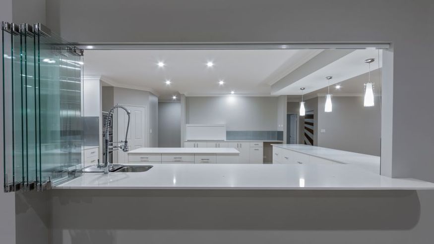 Frameless bi-folds from JH Glass Innovation | ArchitectureAu