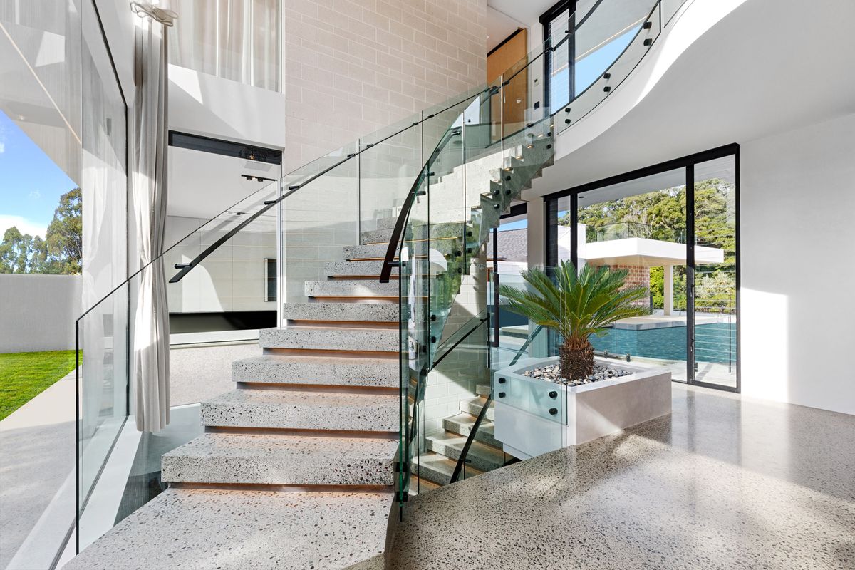 Glasshape curved glass for Sky Garden House staircase | ArchitectureAu